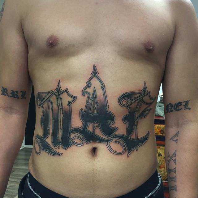 Stomach Lettering Tattoos