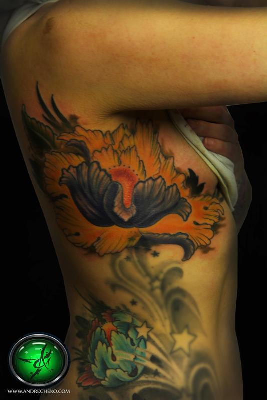 Japanese flower rib color tattoo by Andre Cheko: TattooNOW