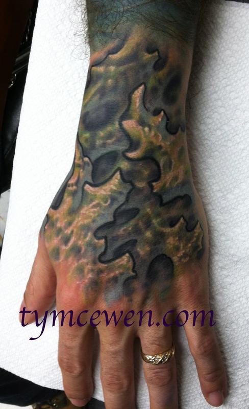 coral biomech hand by Ty McEwen: TattooNOW