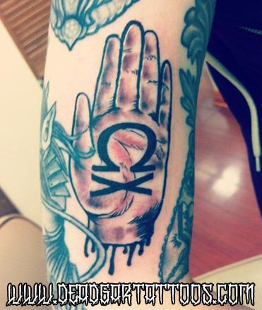 Omega Hand by Edgar: TattooNOW