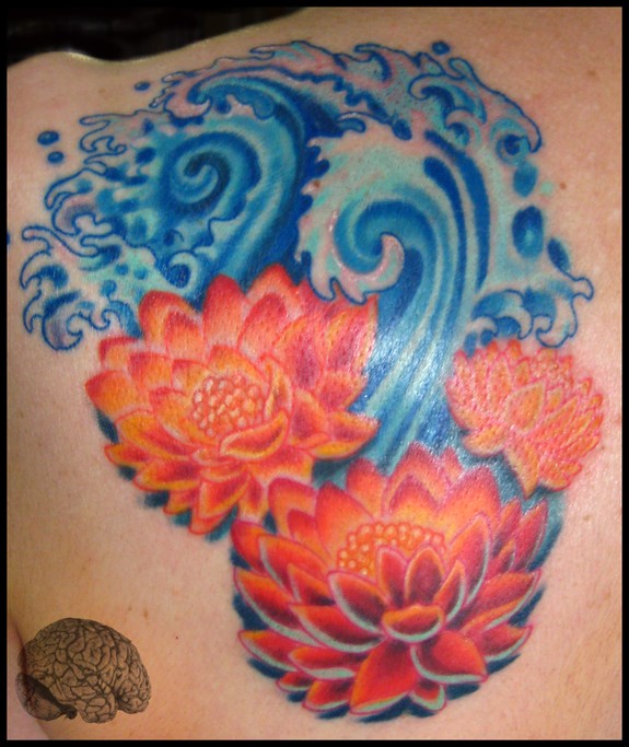 Lotus and water tattoo by Phil Robertson: TattooNOW